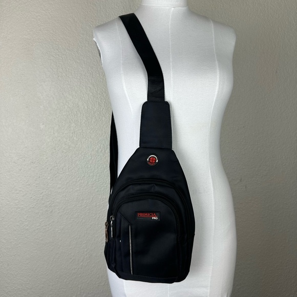 primicia pro | Bags | Cross Body Bag Unisex Black Nylon Backpack ...